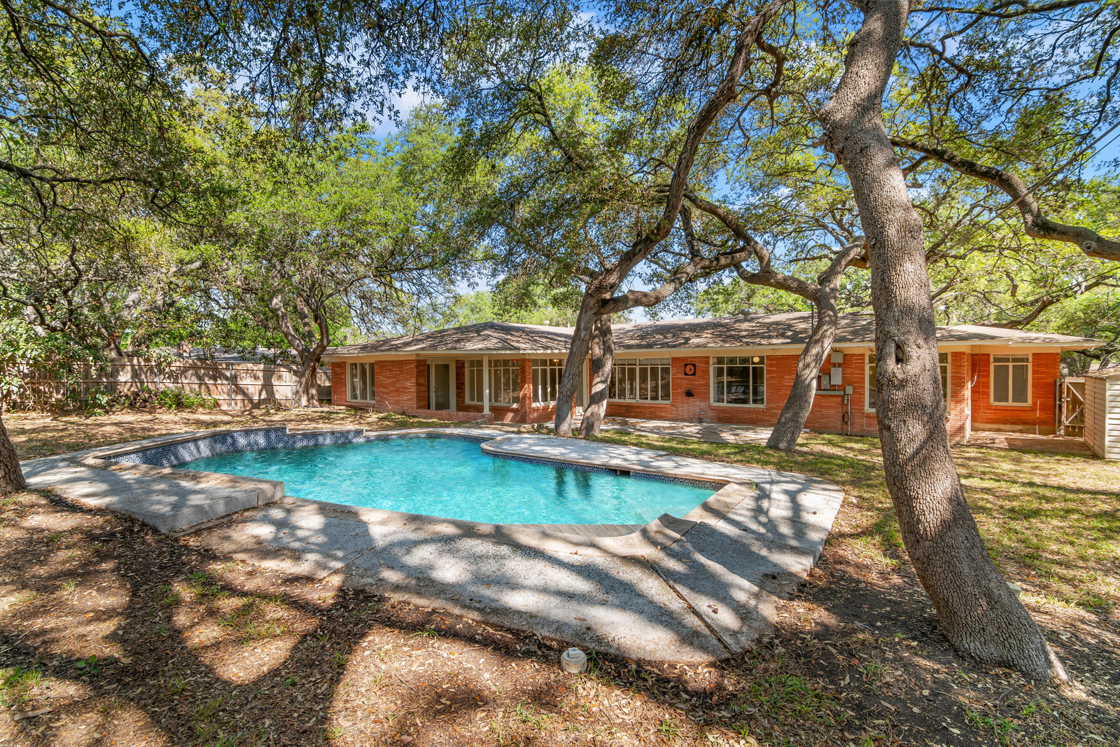 Mid-Century Home With Pool | Kuper Sotheby's International Realty